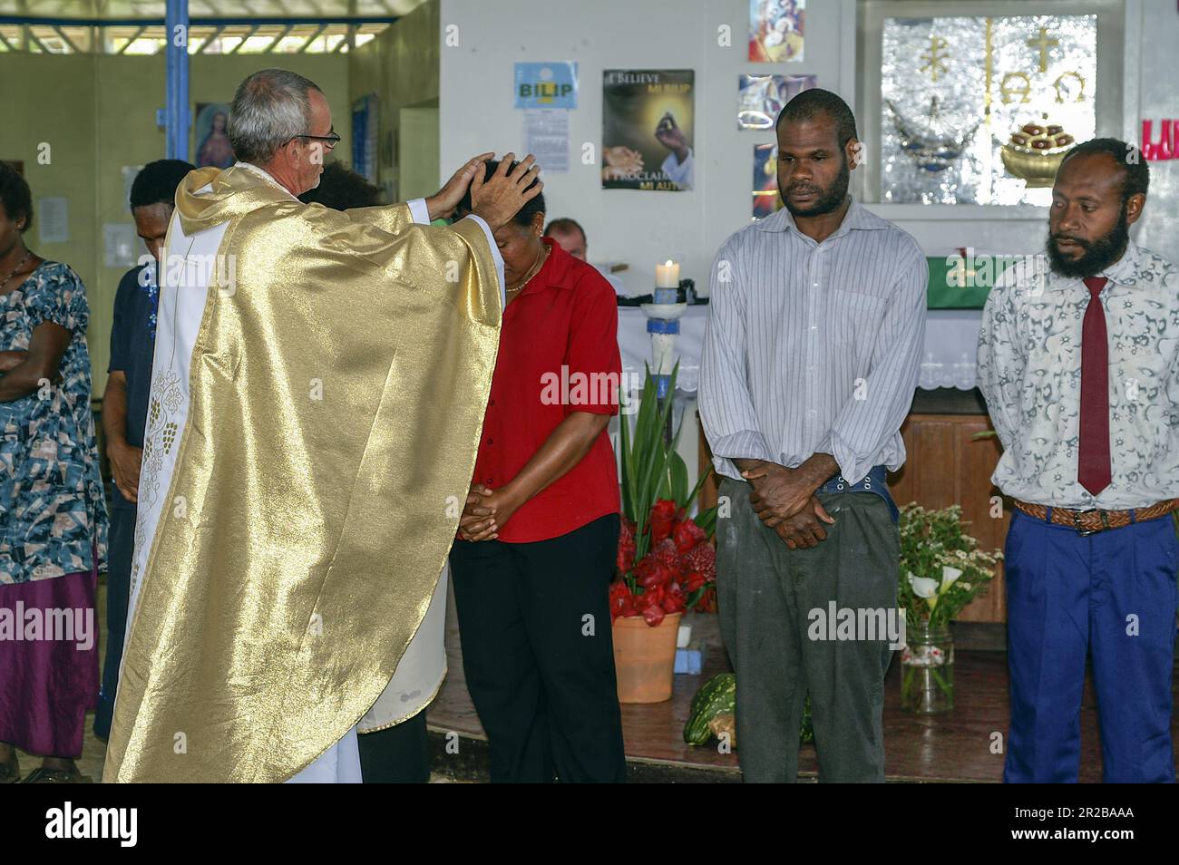 Papua New Guinea; Eastern Highlands; Goroka; The parish priest blesses ...