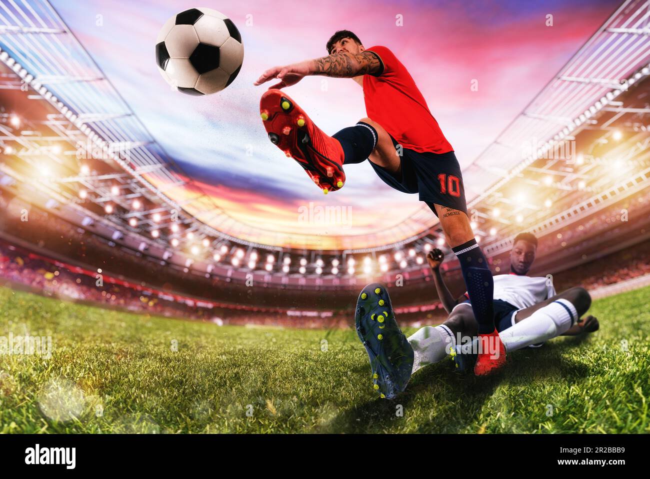 Close up of a football action scene with competing soccer players at ...