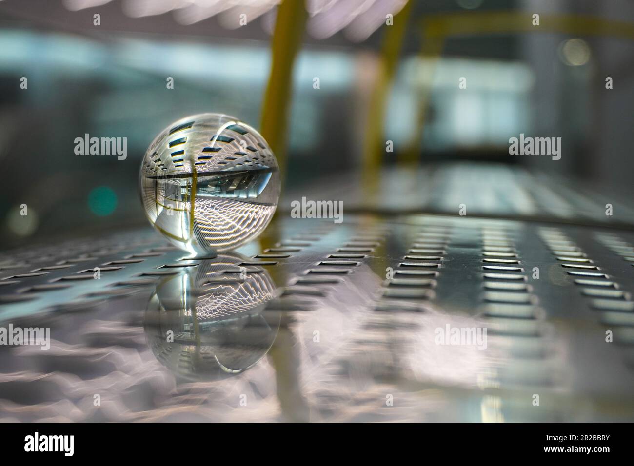 Close-up of crystal ball on metal seat at subway station Stock Photo ...