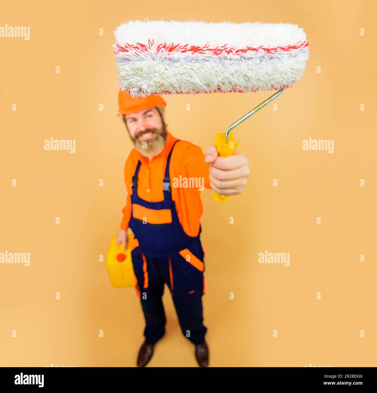 Painter man with paint roller and canister. Interior design, decoration ...