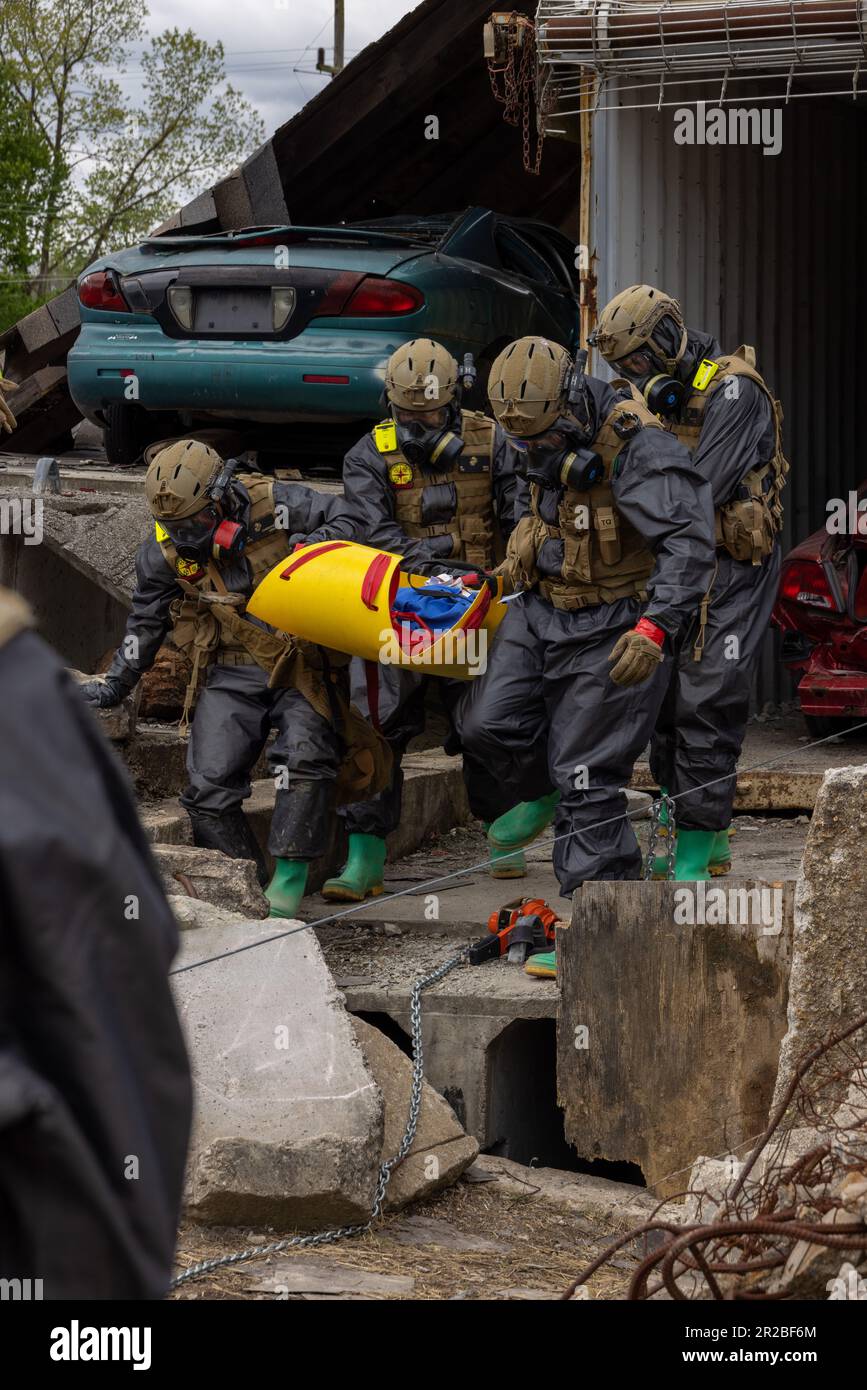 U.S. Marines on a search and rescue team with Alpha Company, Chemical ...