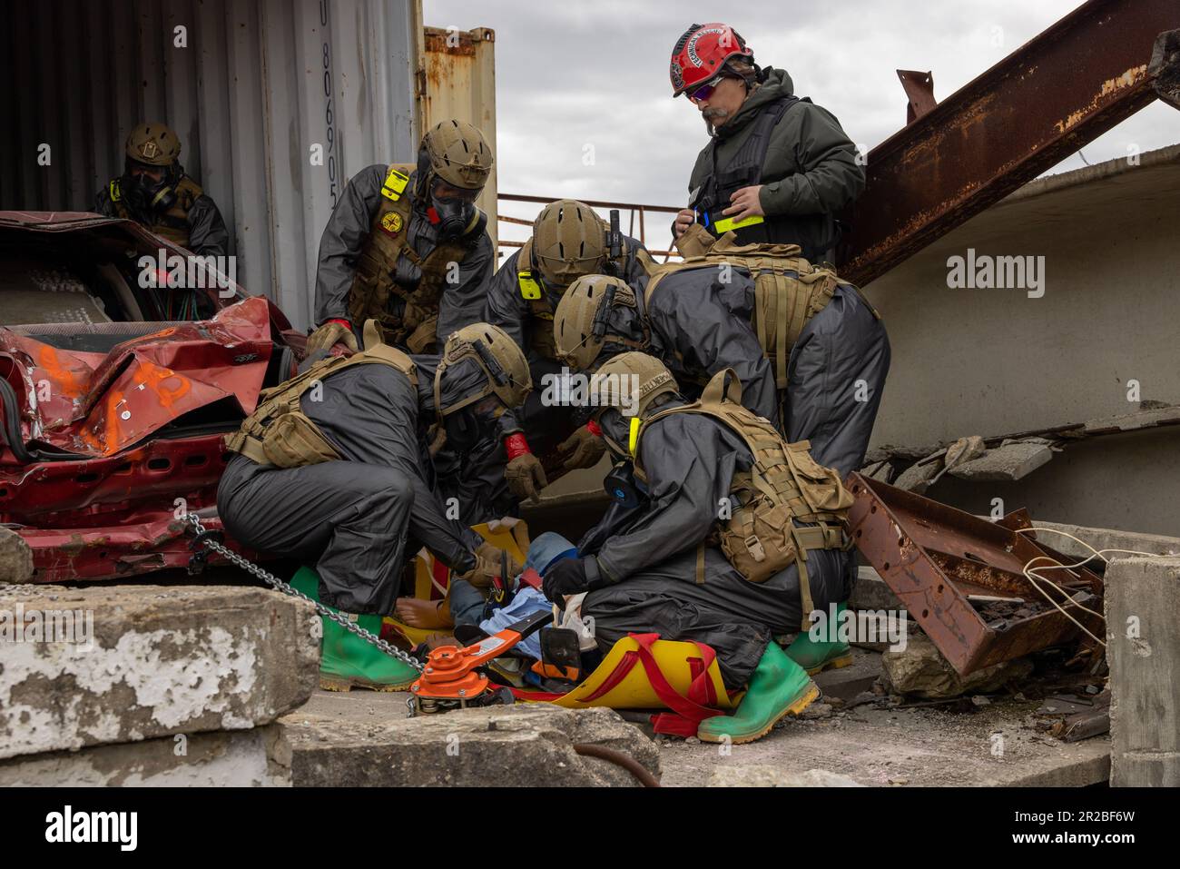 U.S. Marines on a search and rescue team with Alpha Company, Chemical ...