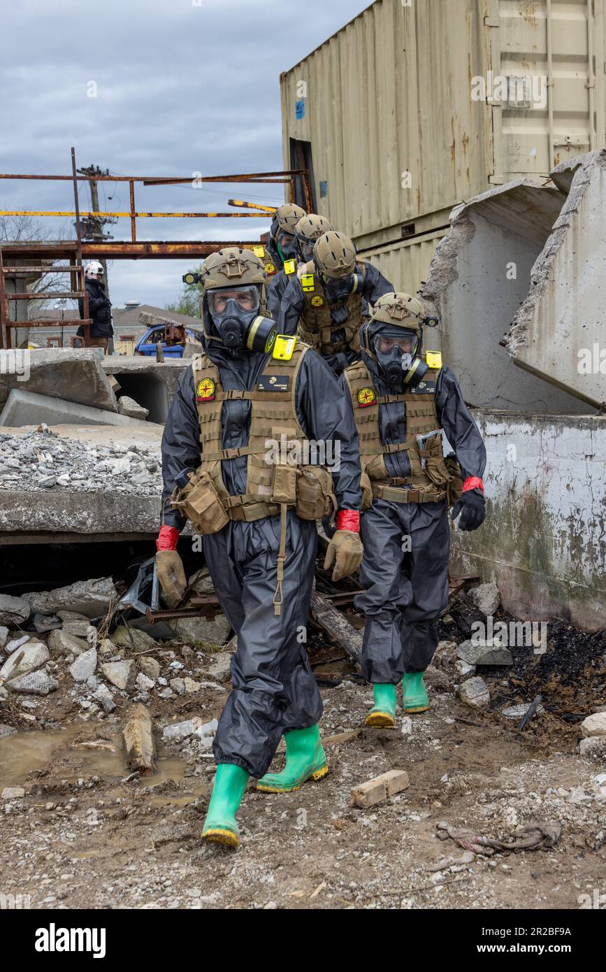 U.S. Marines on a search and rescue team with Alpha Company, Chemical ...