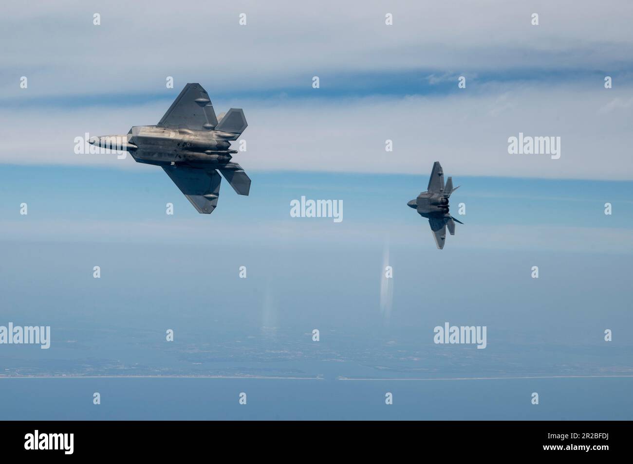 U.S. Air Force F-22 Raptors assigned to the 43d Fighter Squadron fly ...