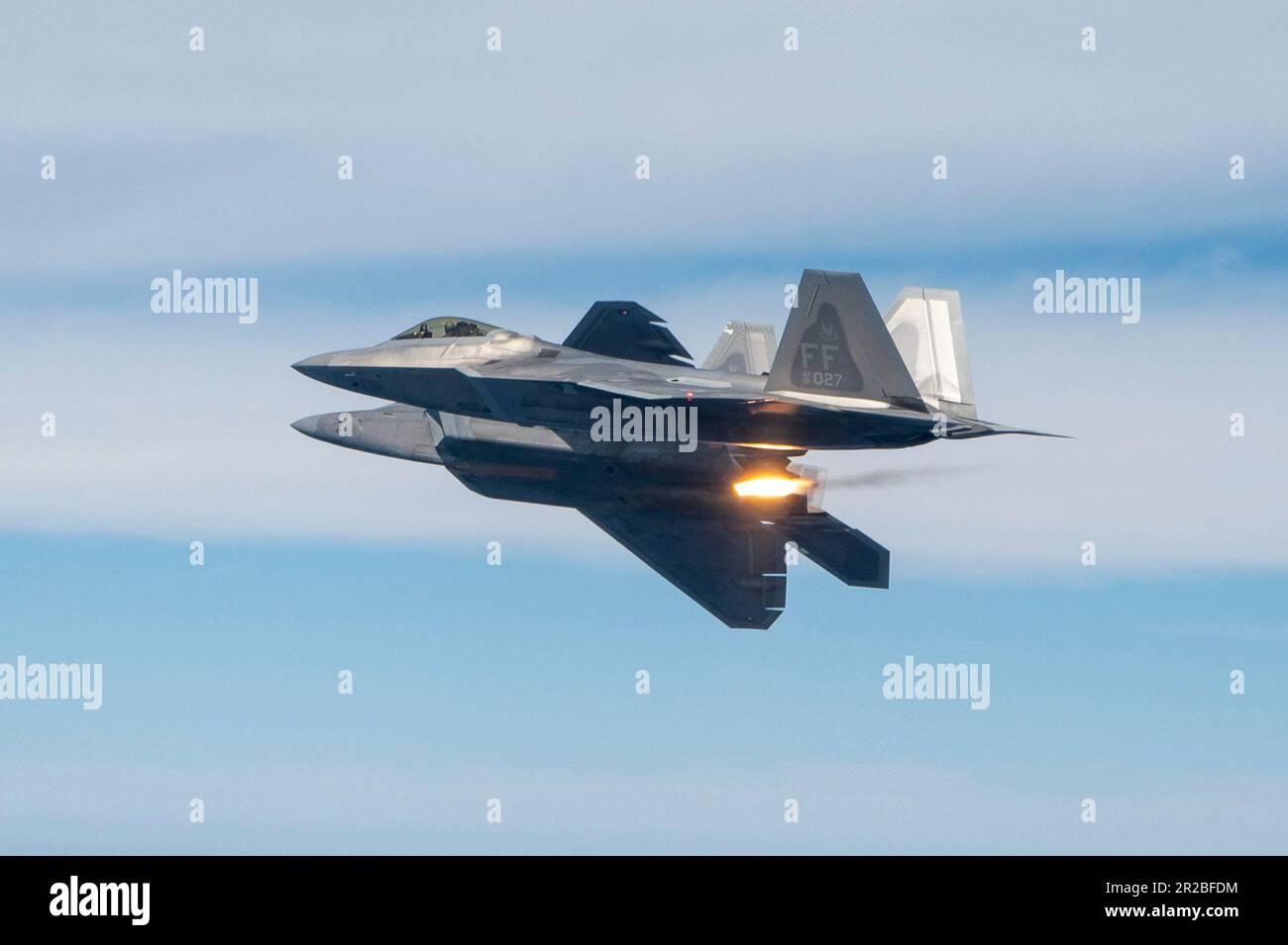 U.S. Air Force F-22 Raptors assigned to the 43d Fighter Squadron drop ...