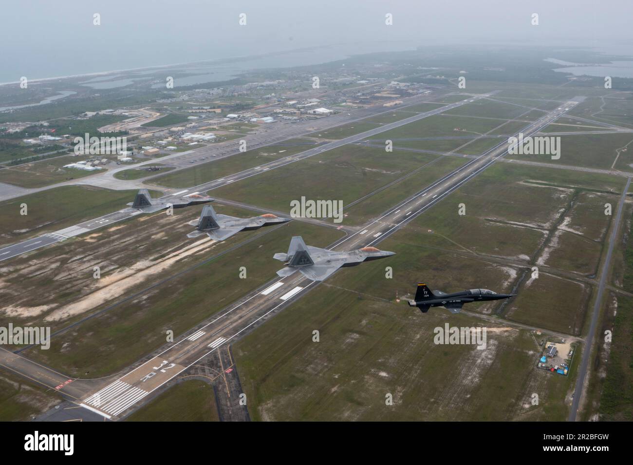 U.S. Air Force F-22 Raptors assigned to the 43d Fighter Squadron and a ...