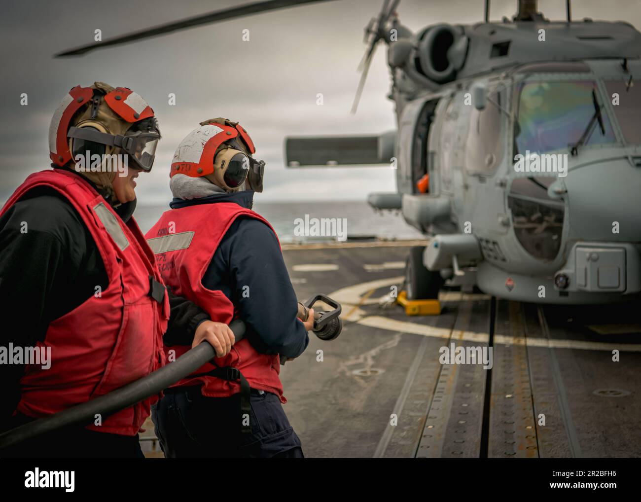 Machinery Repairman 1st Class Patrisha Castro (left) and Damage Control ...