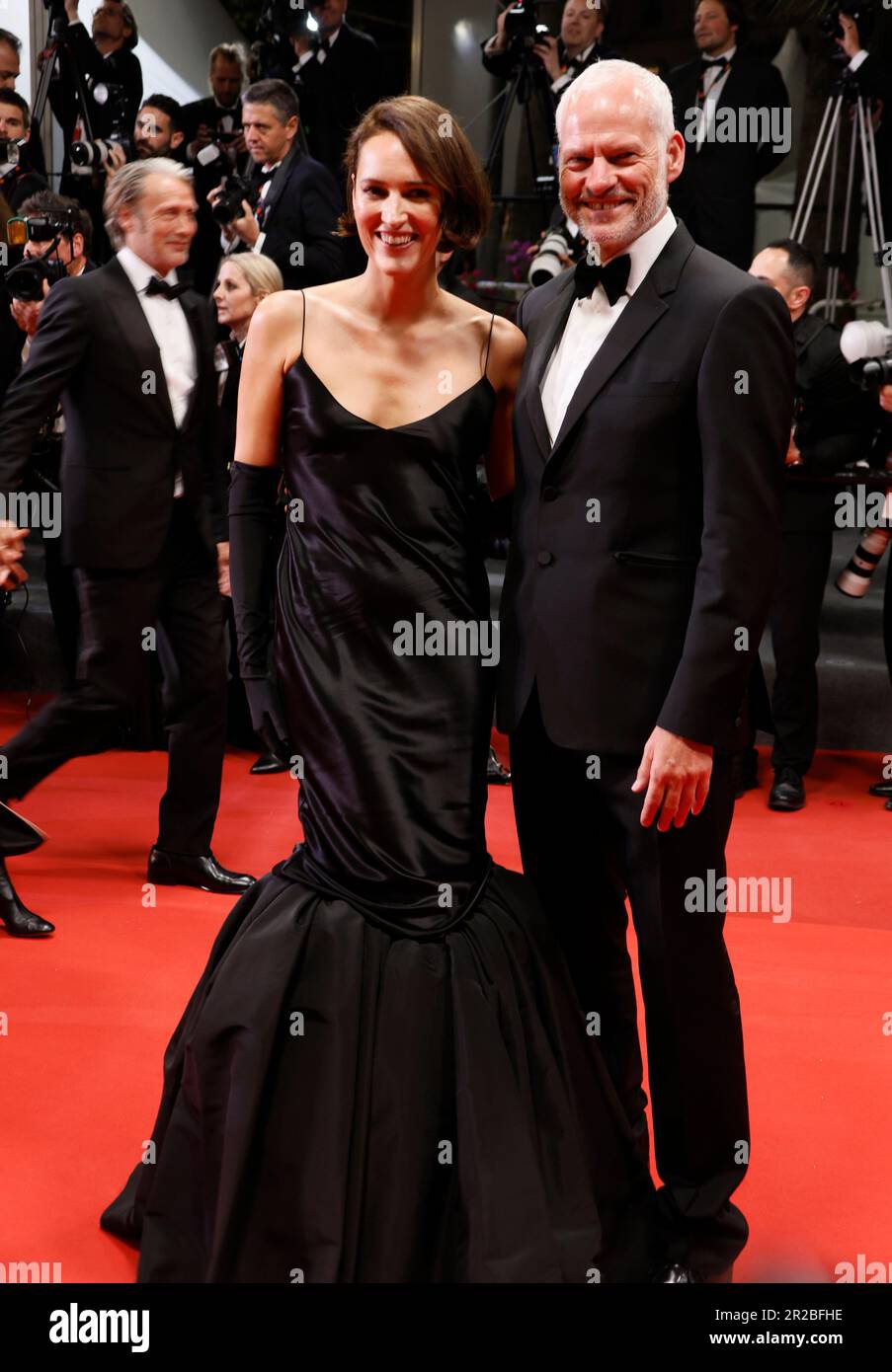 Phoebe Waller-Bridge, left, and Martin McDonagh pose for photographers ...