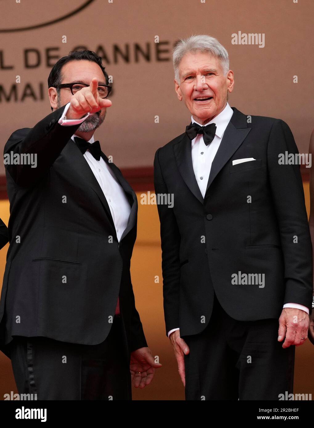 Director James Mangold, left, and Harrison Ford pose for photographers ...