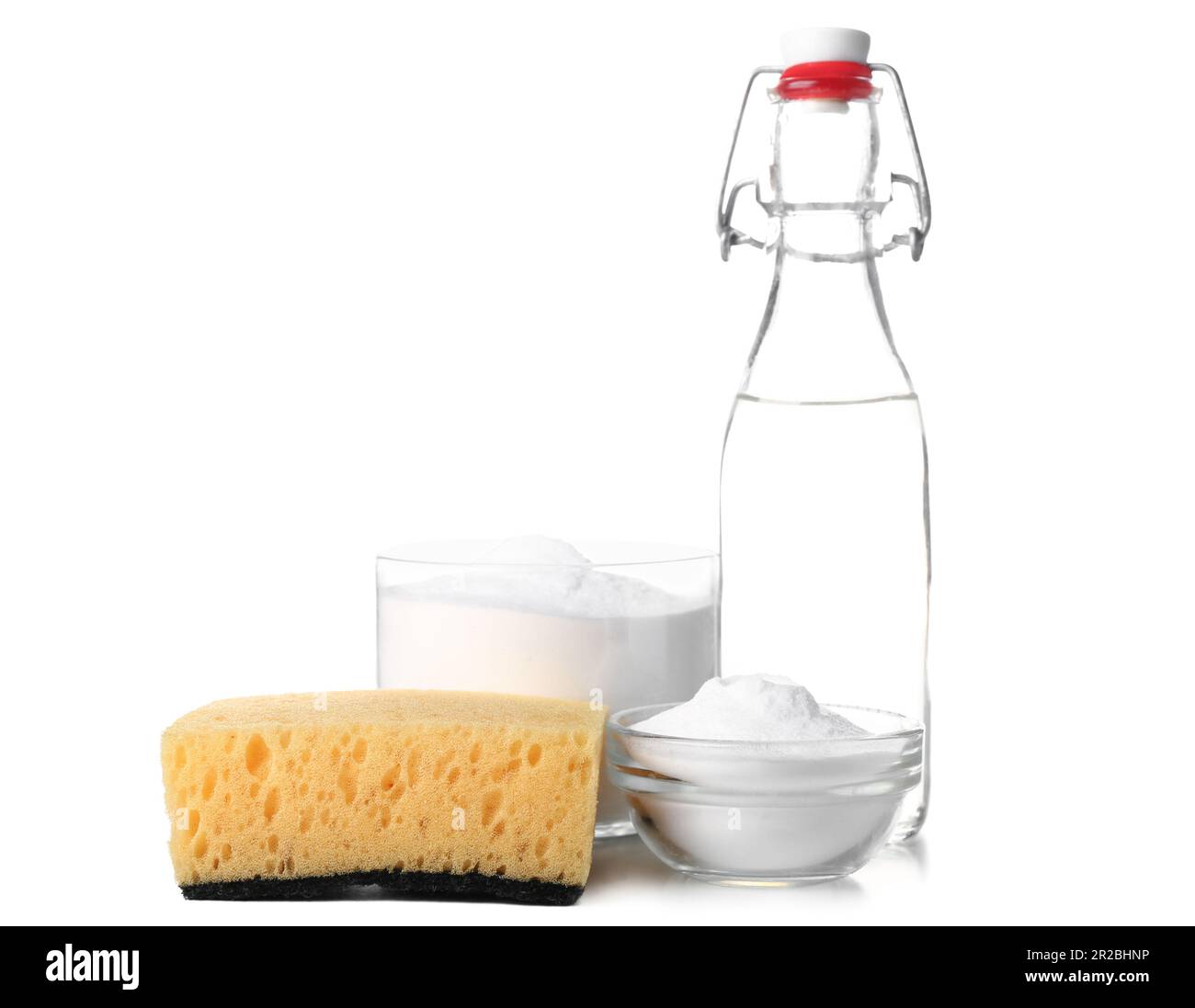 Bottle of vinegar, baking soda and cleaning sponge on white background ...