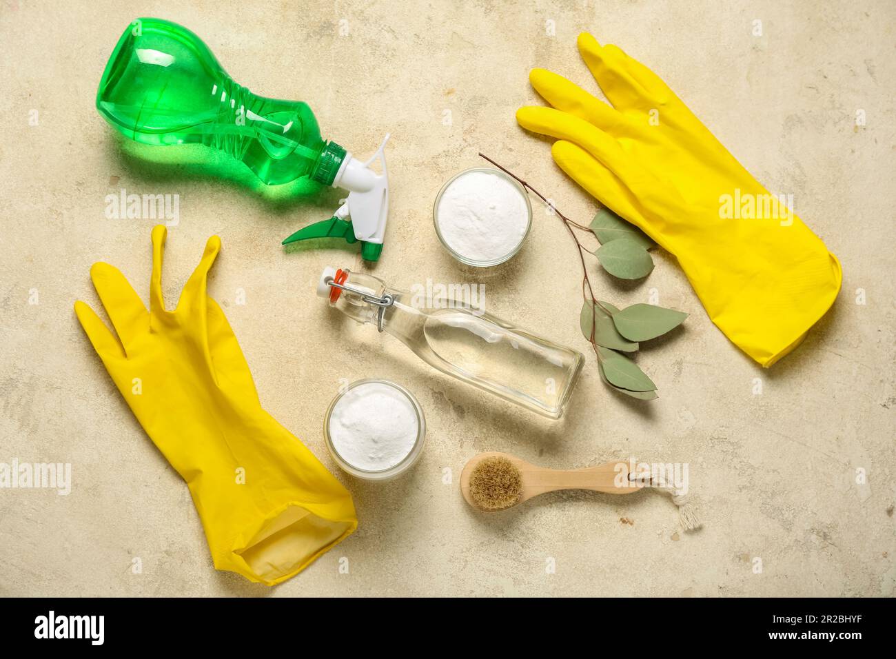 Composition with cleaning supplies on grunge background Stock Photo - Alamy