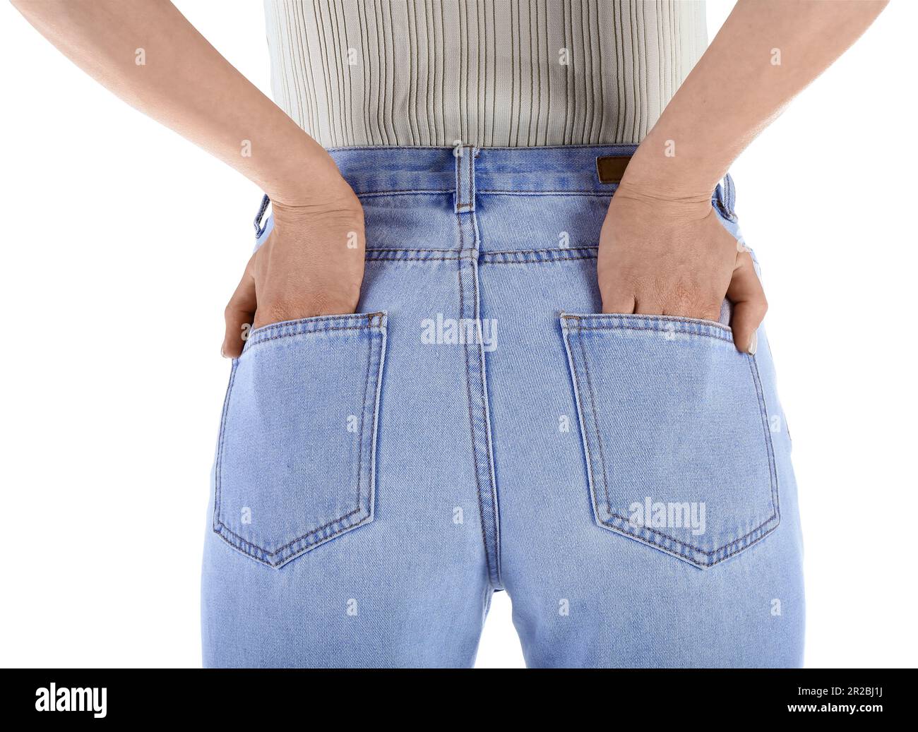 Young woman in stylish jeans on white background, back view Stock Photo ...