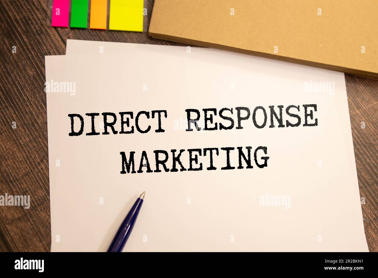 direct response marketing, text on white paper on a light background ...