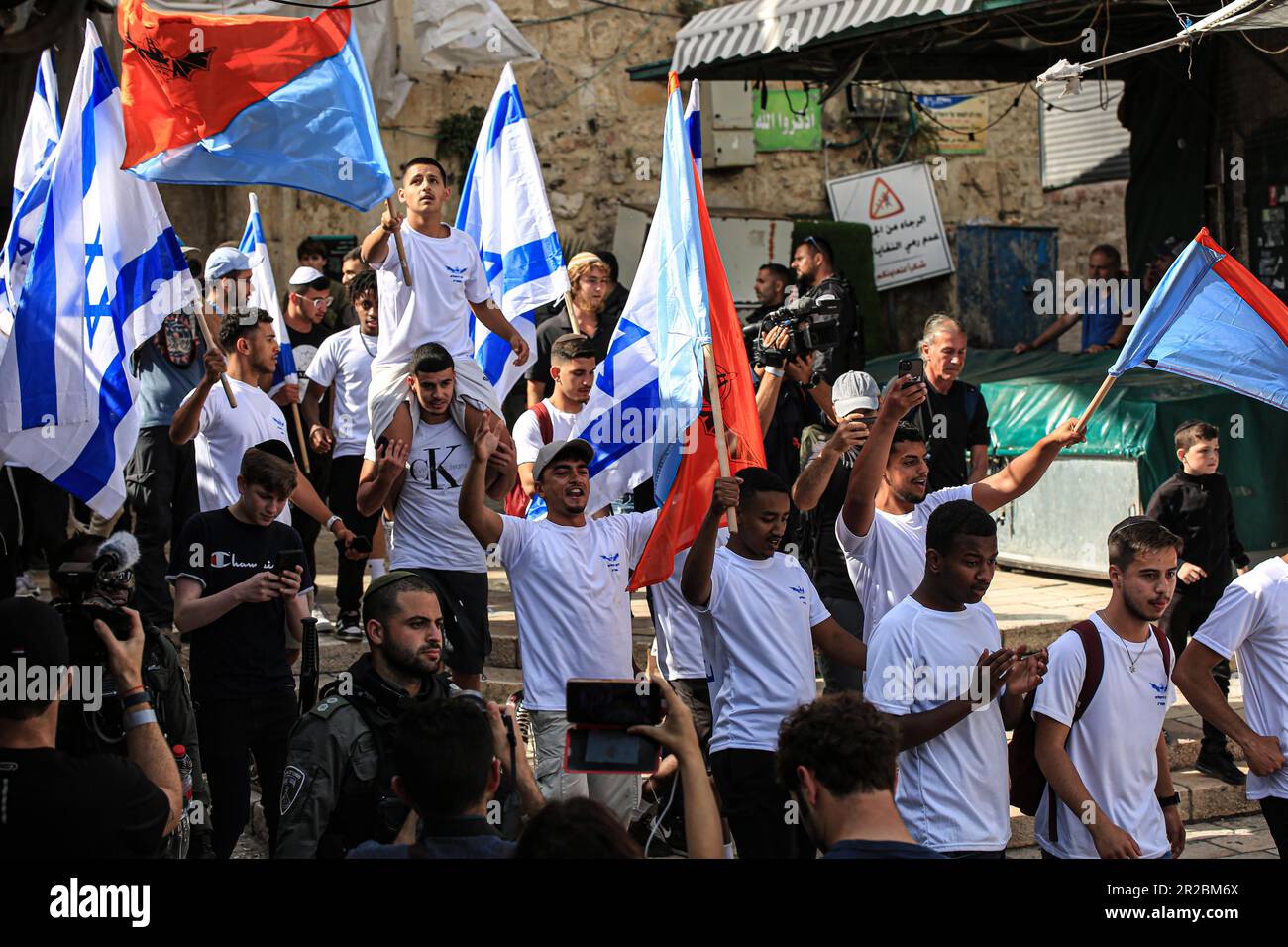 East Jerusalem, Israel. 18th May, 2023. Demonstrators waving Israeli ...