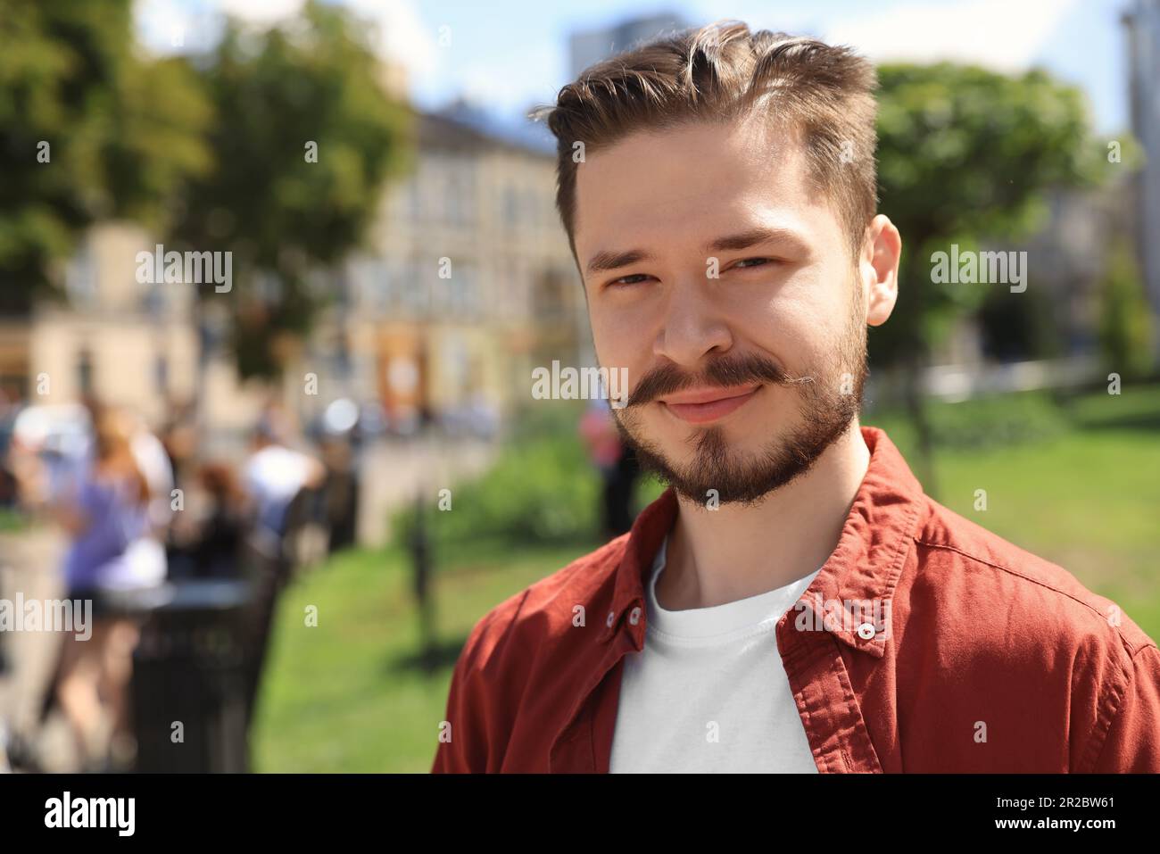 Man standing in park hi-res stock photography and images - Alamy