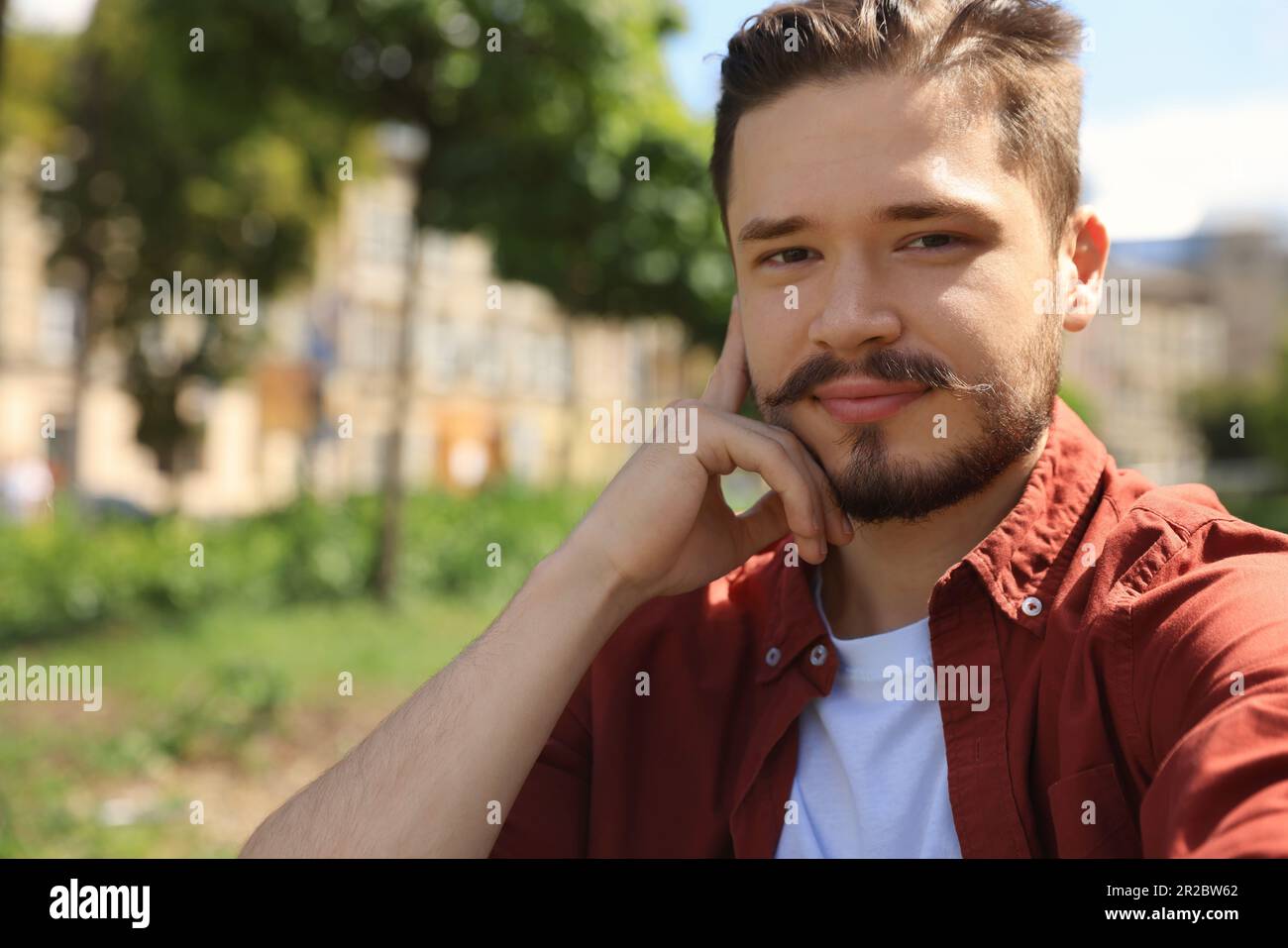 Man touching clothes outside hi-res stock photography and images - Alamy