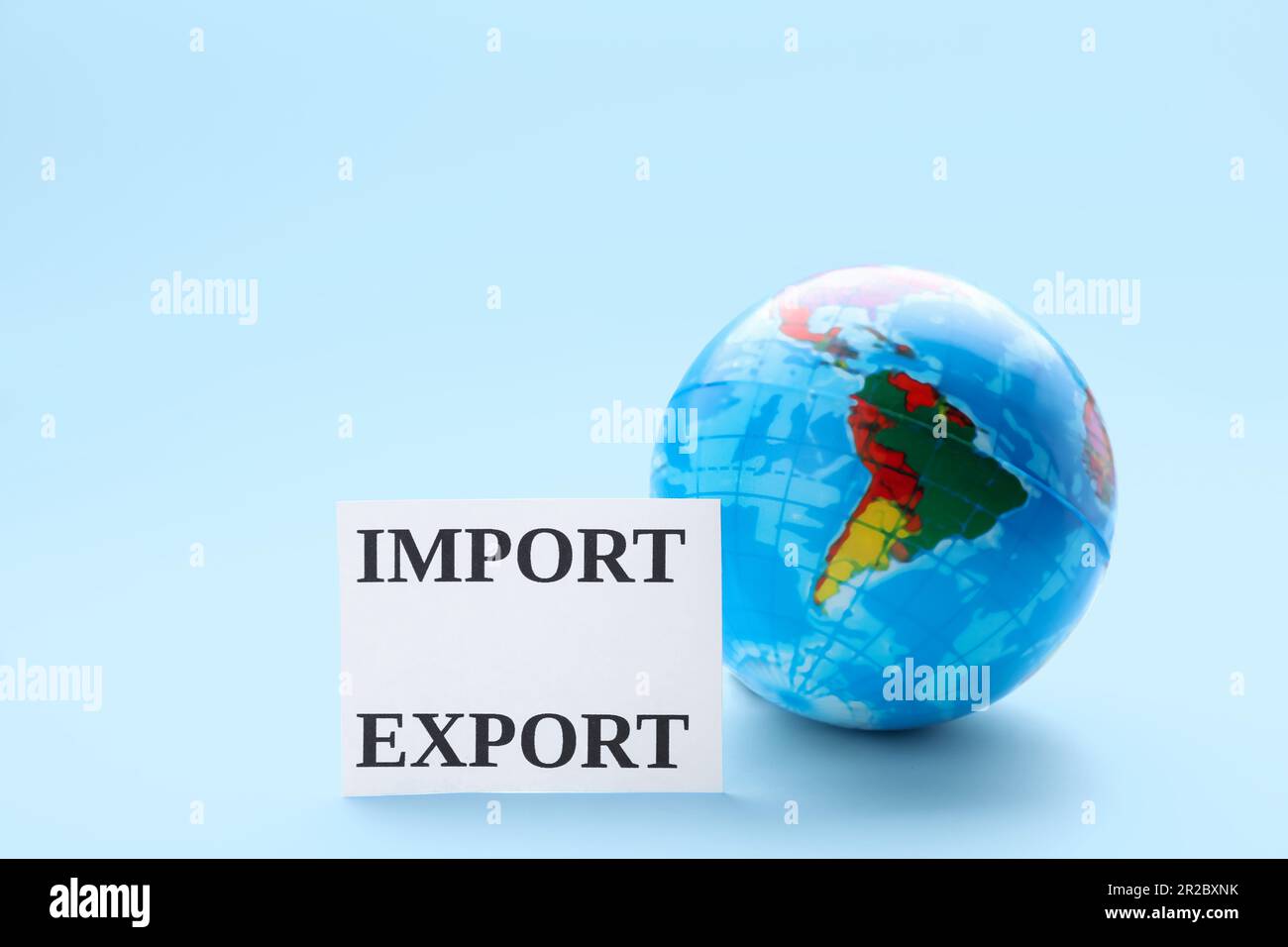 Card with words Import and Export, globe on light blue background Stock ...