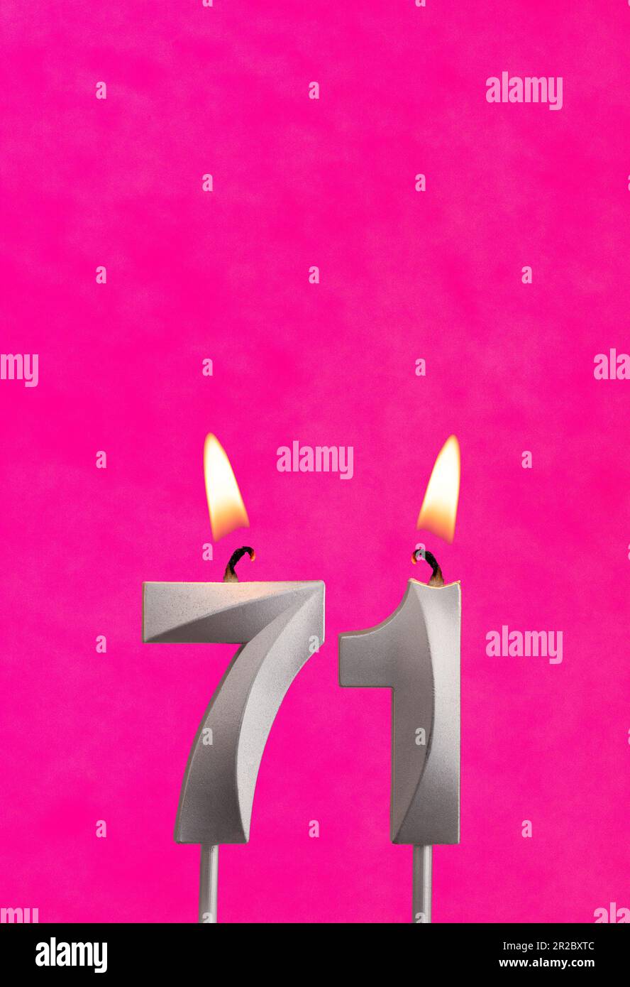 Number 71 candle - Birthday celebration on fuchsia background Stock ...