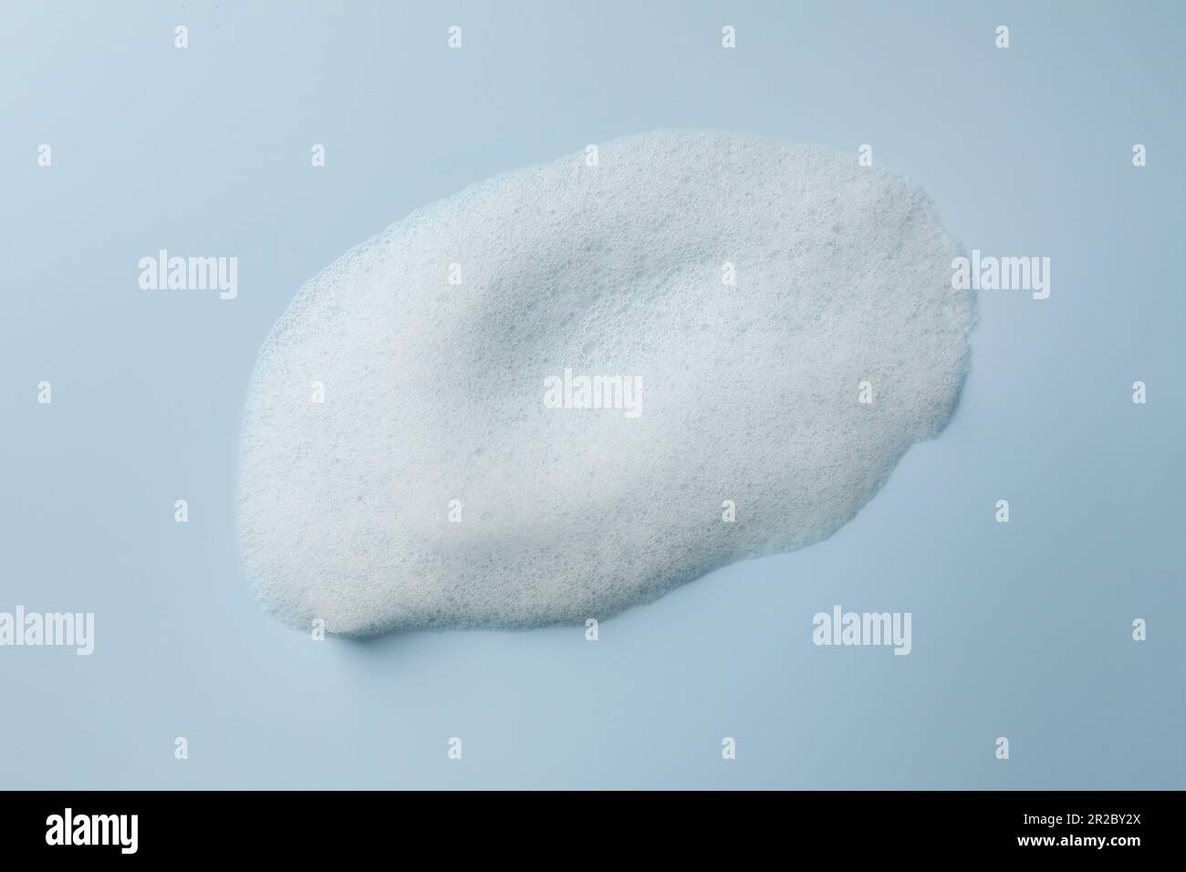 Foam sample on light blue background, top view Stock Photo - Alamy