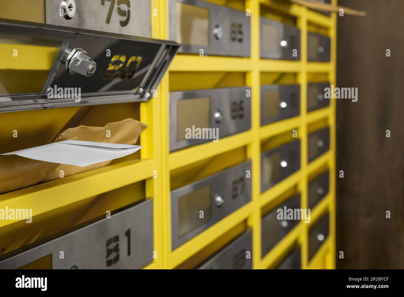 Open metal mailbox with correspondence in post office, closeup Stock ...