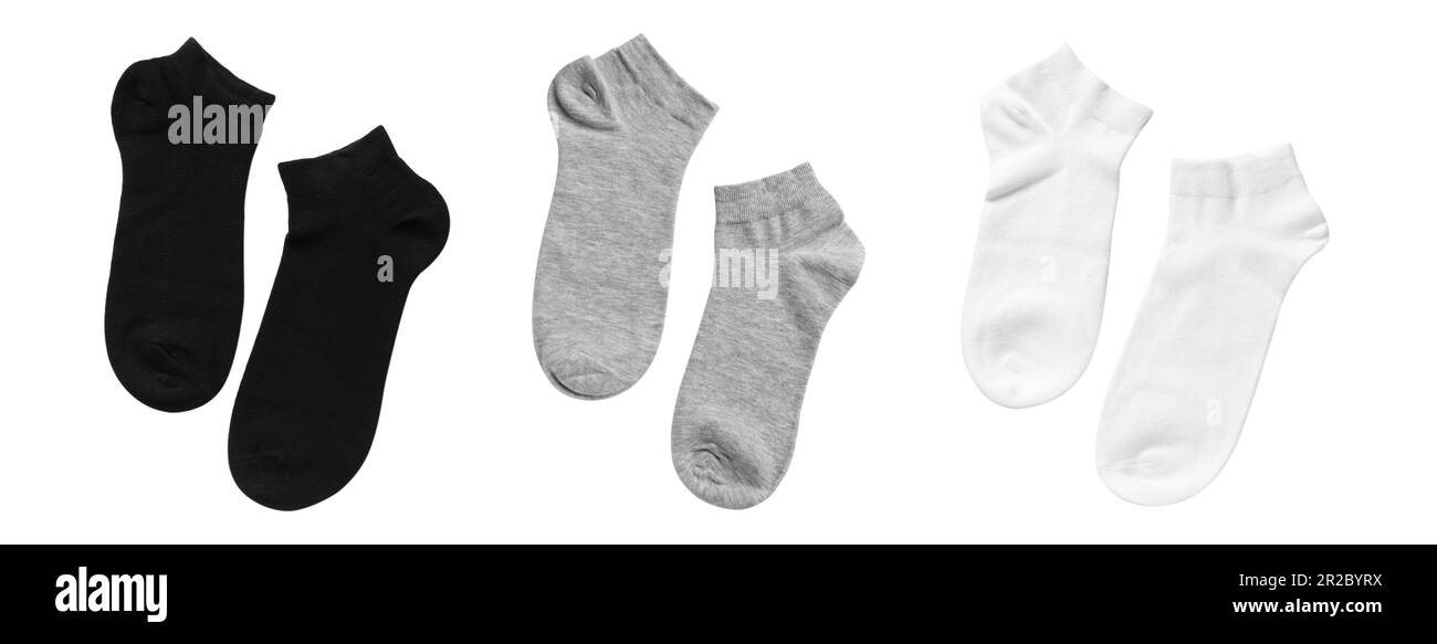 Set with different socks on white background. Banner design Stock Photo ...