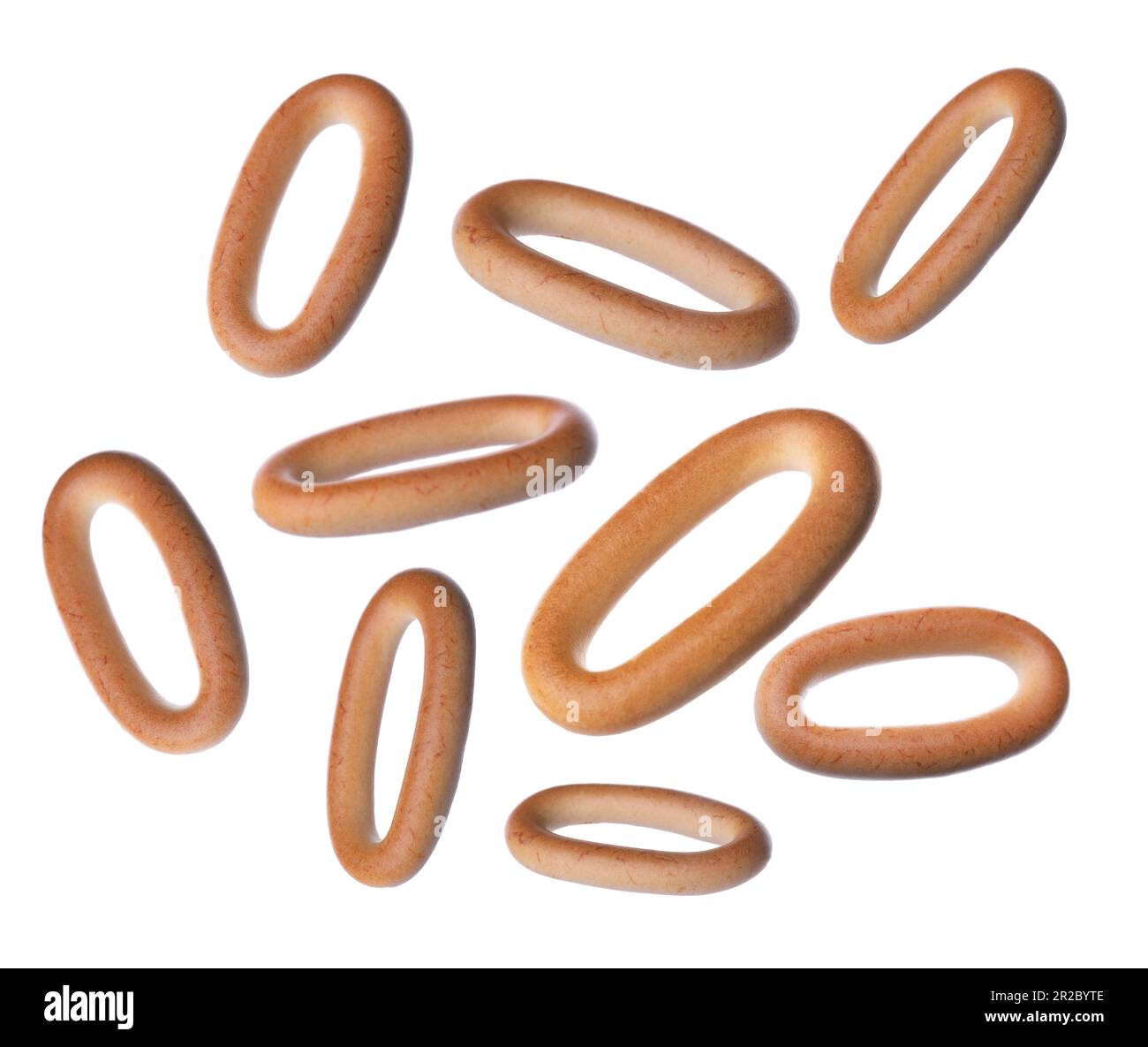 Falling Sushi (dry bagels) on white background Stock Photo - Alamy