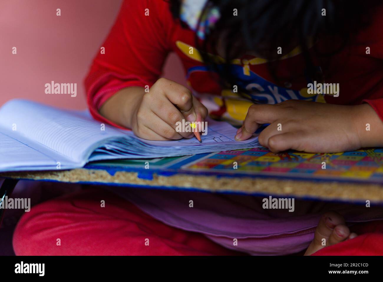 asian girl practice writting with pencil in home Stock Photo - Alamy