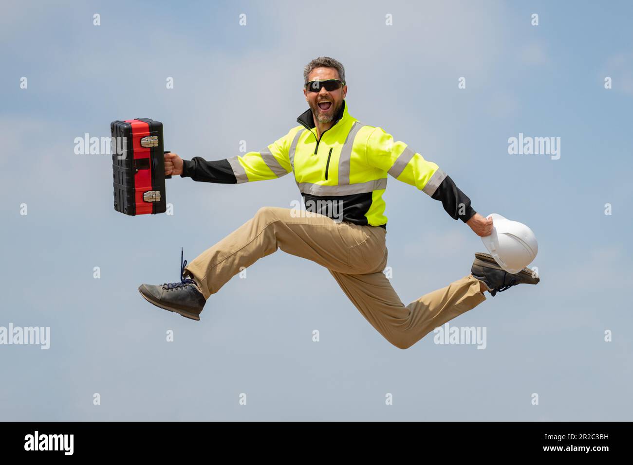 Construction builder excited jump hi-res stock photography and images ...