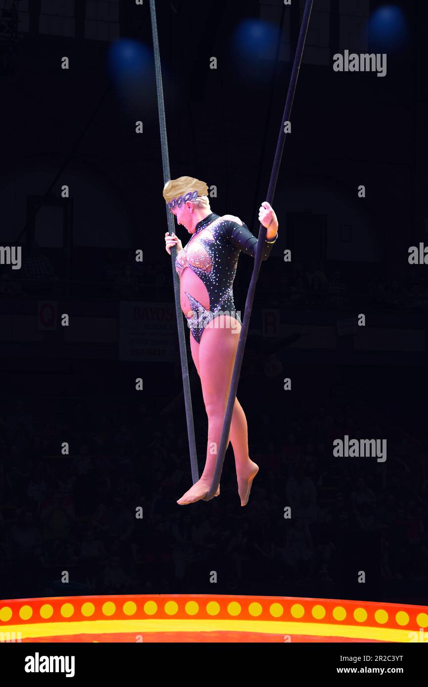 One Circus Performer Balances on a Tightrope to woo an Audience Stock ...