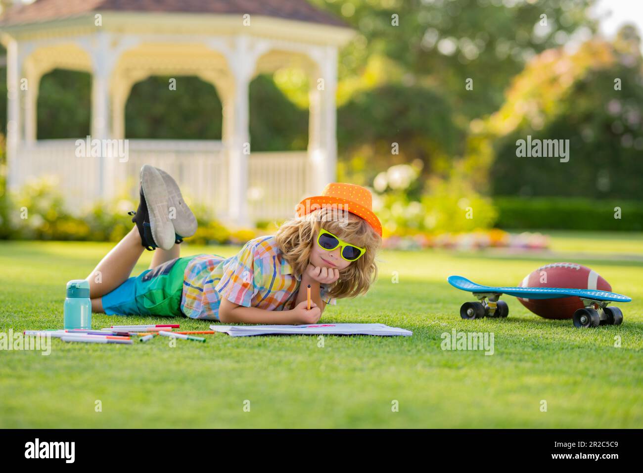 Little painter draw pictures outdoor. Child artist, kids crafts. School ...