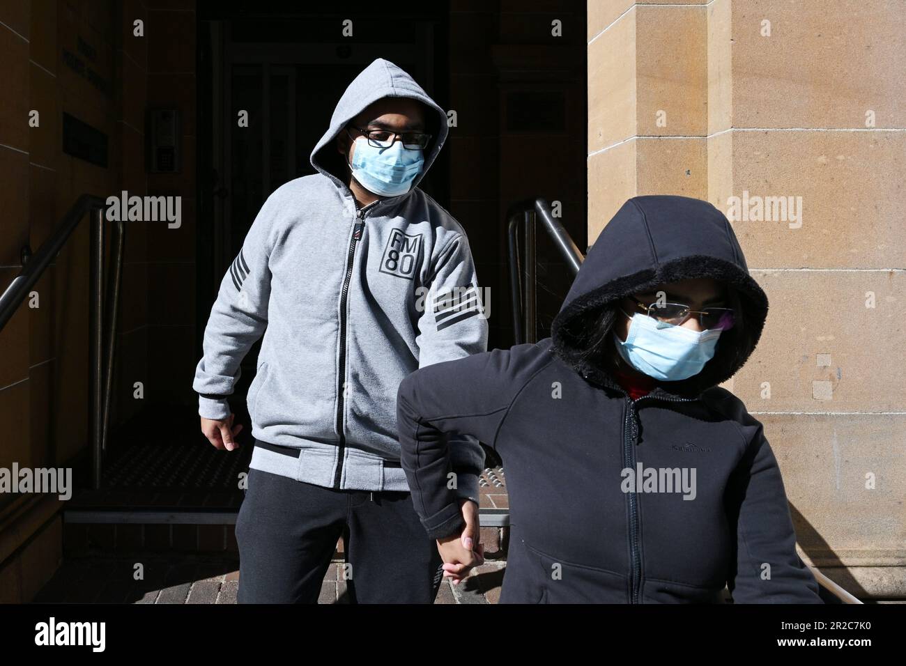Vansh Khanna (centre) leaves Manly Police Station with family members ...