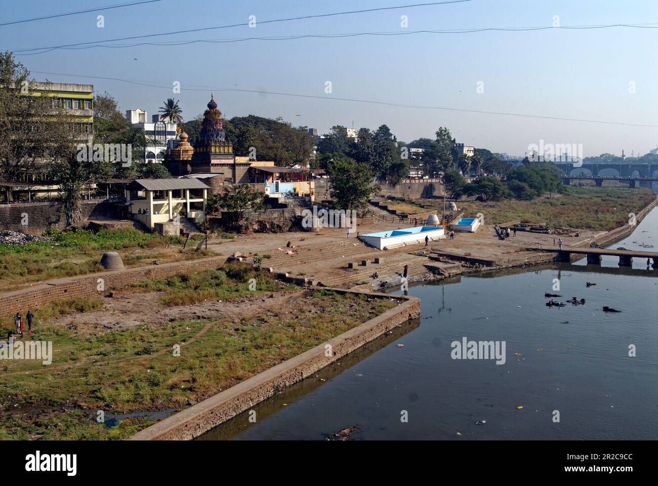 Ancient temple and a Ghat on polluted river Mutha at Pune state ...
