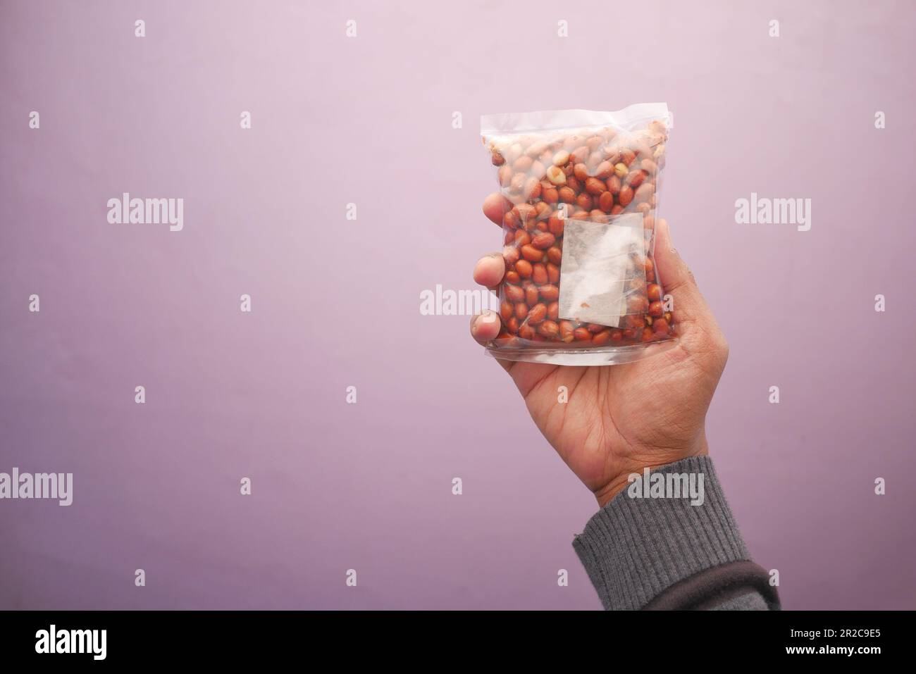 Packet of salted peanuts hi-res stock photography and images - Alamy