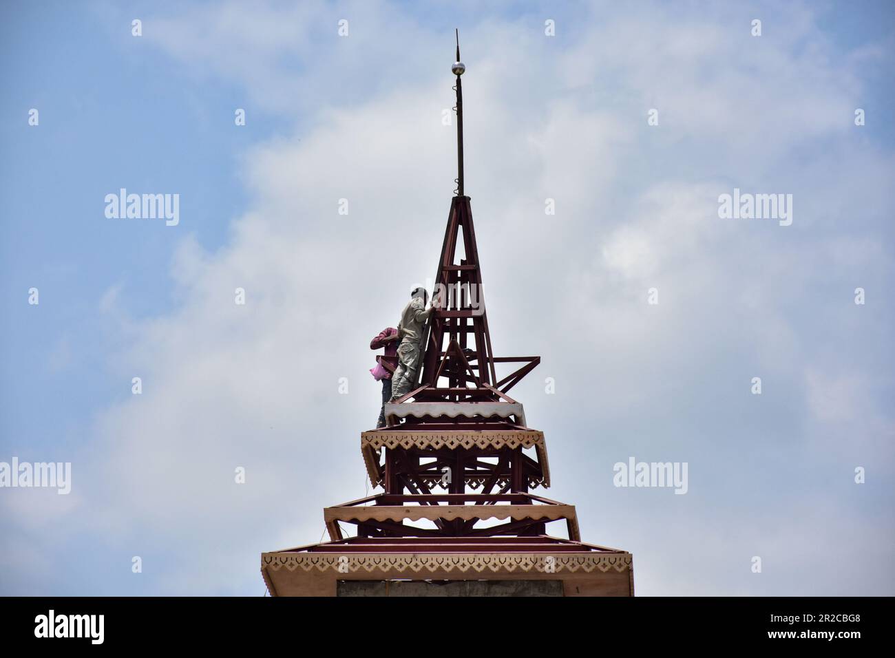 Srinagar, India. 18th May, 2023. A laborer works on the newly renovated ...