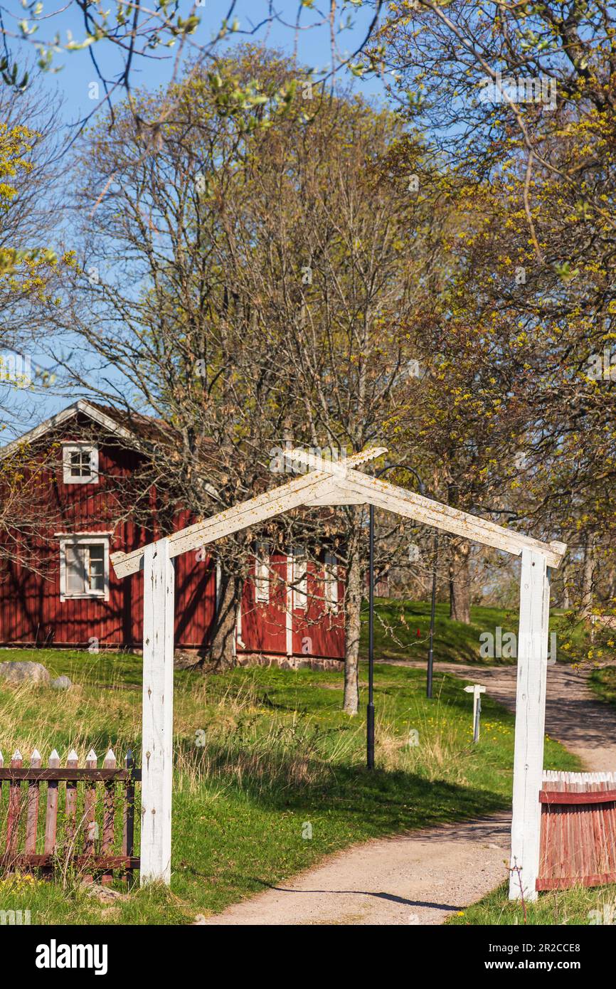 White wooden gate to Seili hospital buildings on Seili island in ...