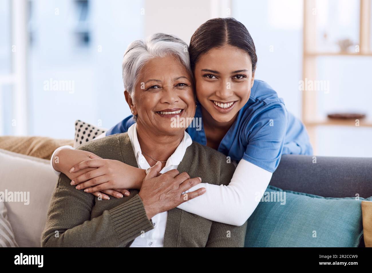 Portrait, happy and nurse hug old woman in retirement house, bonding ...
