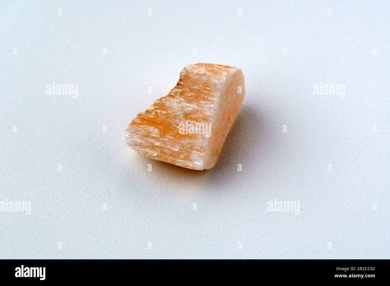 Red Gypsum stone mineral, white background, close-up, black background ...