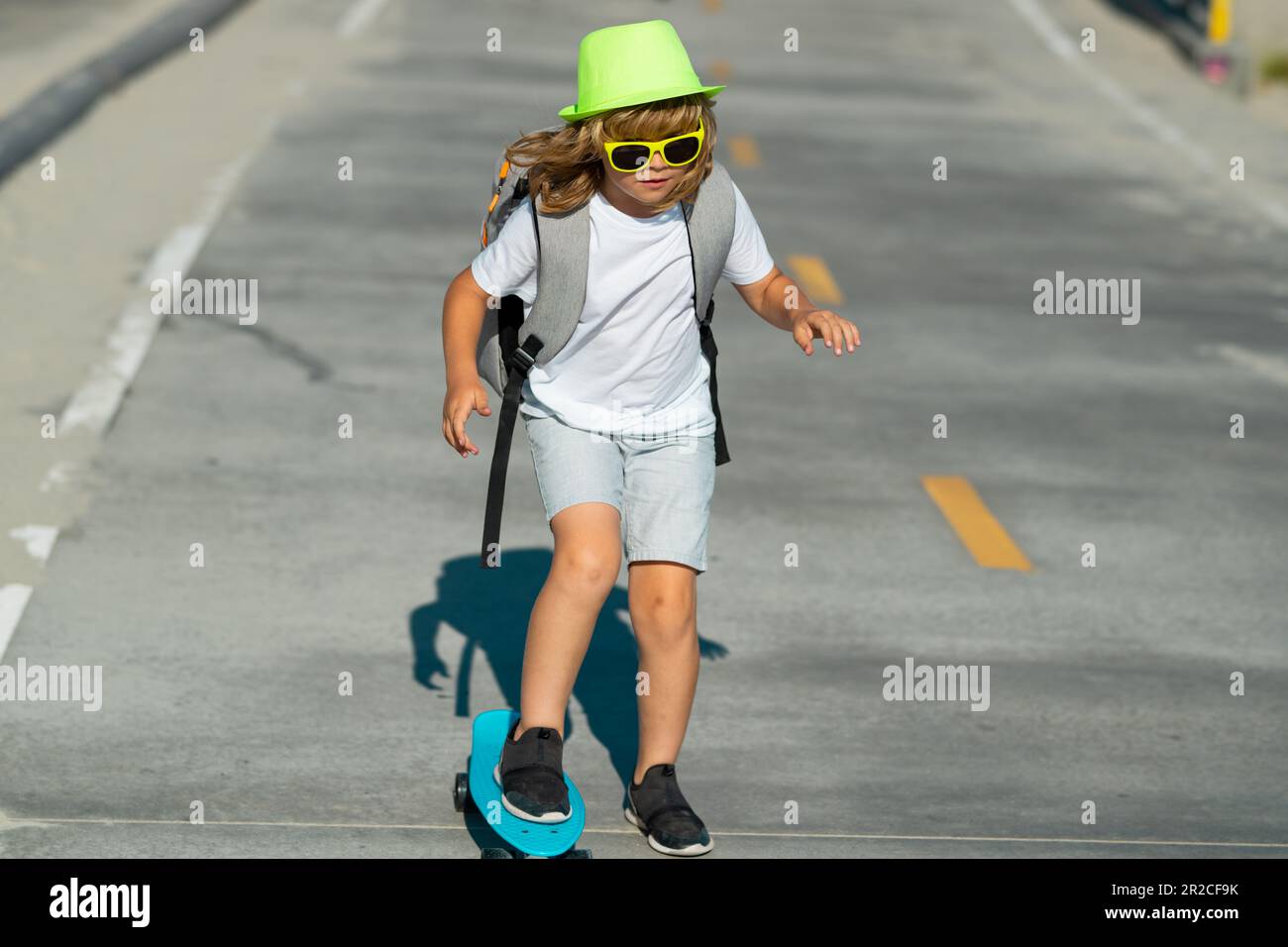 Kid with skateboard. Child hold skate board. Healthy sport and activity ...