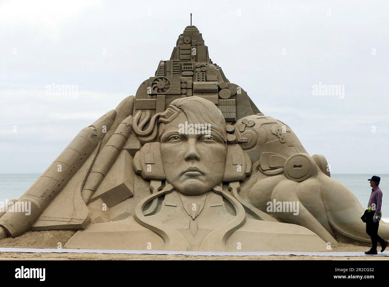 19th May, 2023. Sand fest A man looks at a sand sculpture at an annual ...