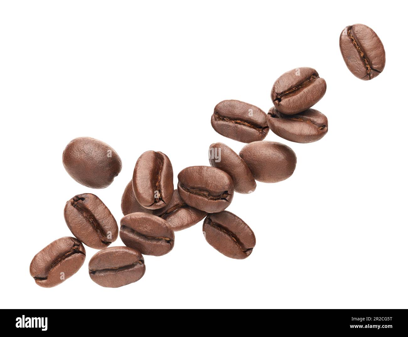 Spilled coffee beans isolated on white background Stock Photo - Alamy