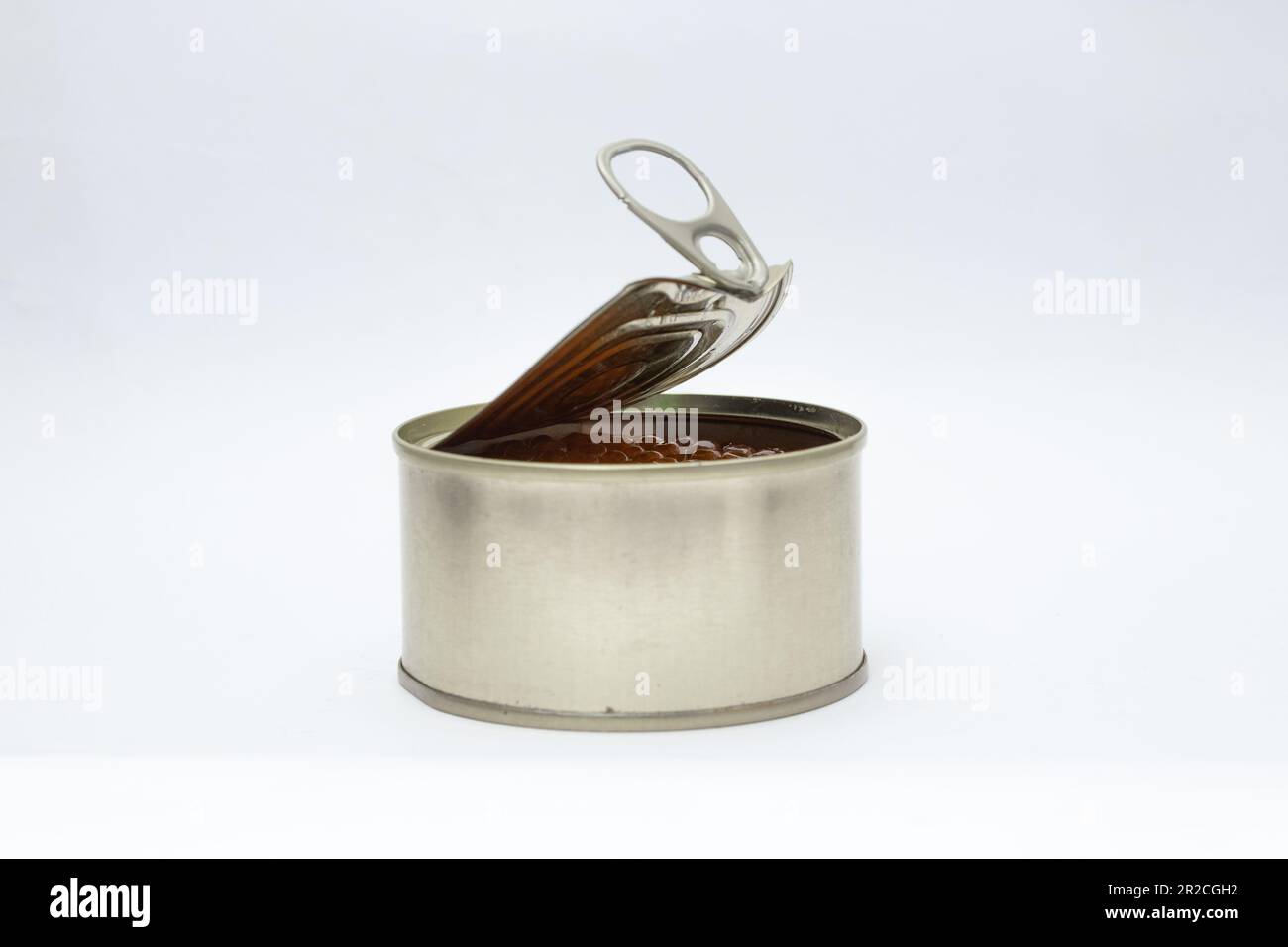 iron can with red caviar on isolated background close up Stock Photo ...