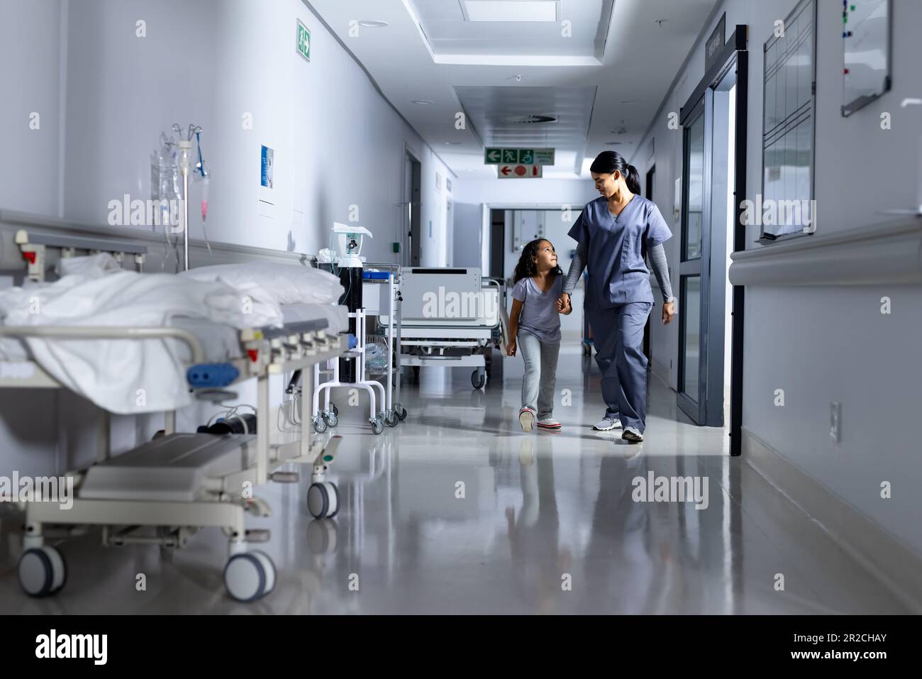 Doctor walking talking patient in hi-res stock photography and images ...