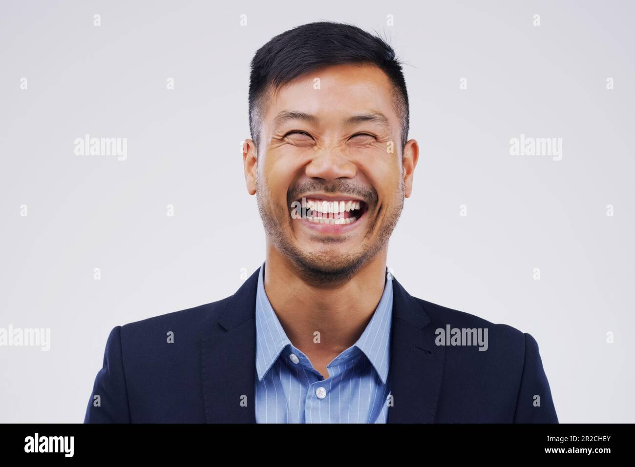 Happy, laughing and portrait of businessman in a studio with comedy ...