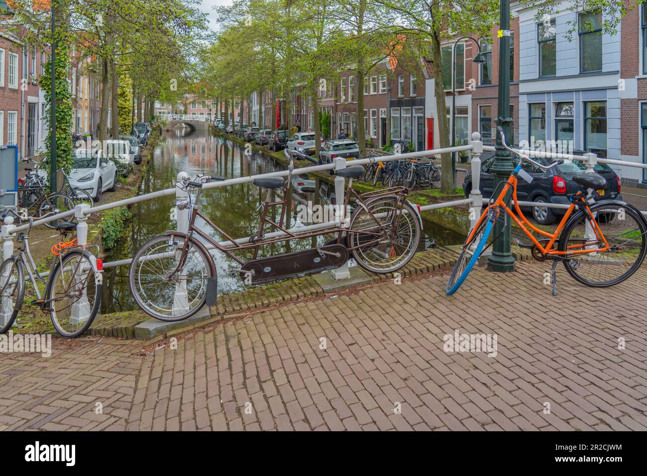 Delft, The Netherlands - April 26, 2023: Old Delft canal in spring with ...