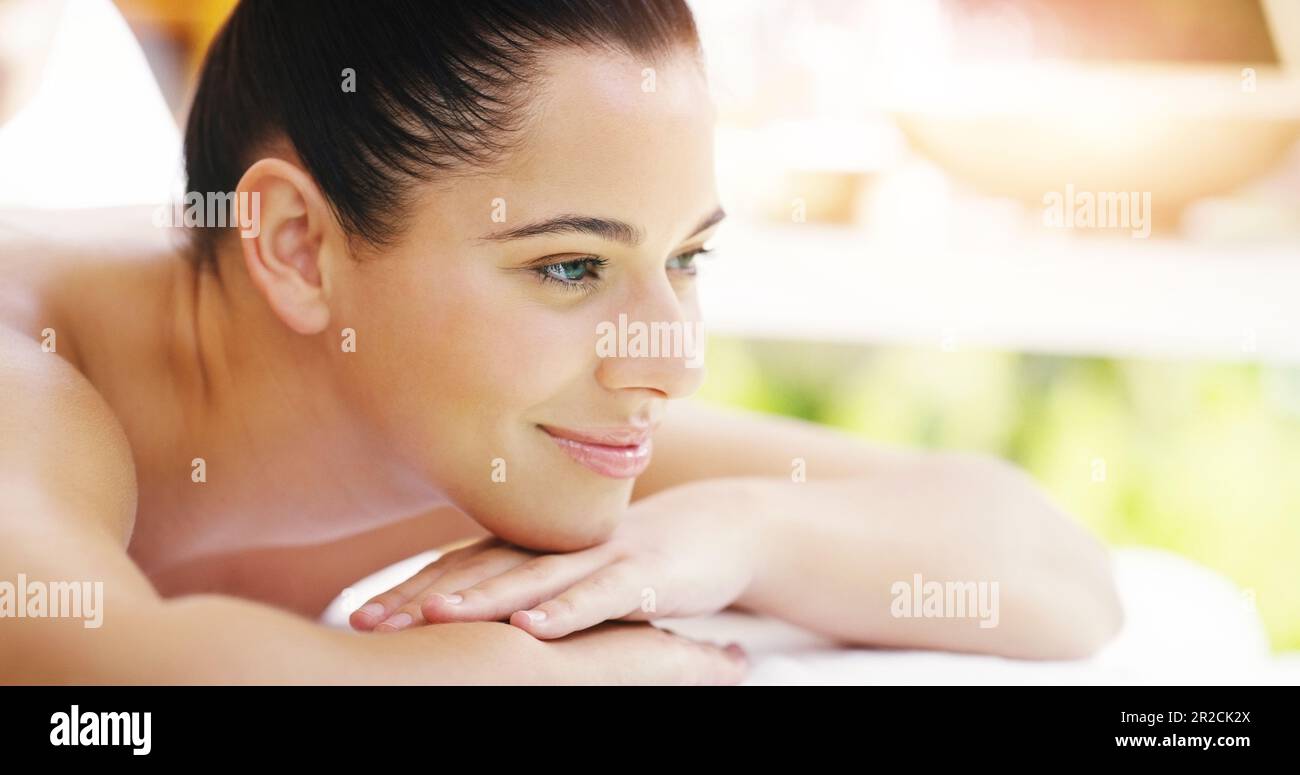 Happy woman, relax and smile in massage at spa for healthy wellness ...