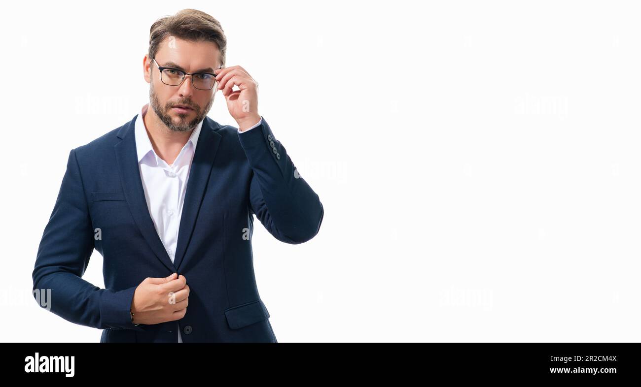 Handsome middle aged man in suit isolated on studio background. Close ...
