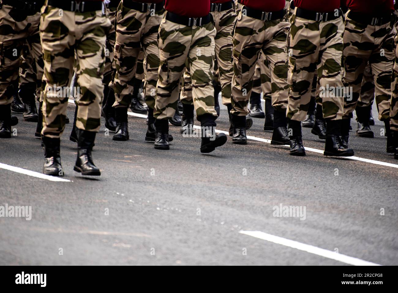 Group of soldiers are marching on road Stock Photo - Alamy