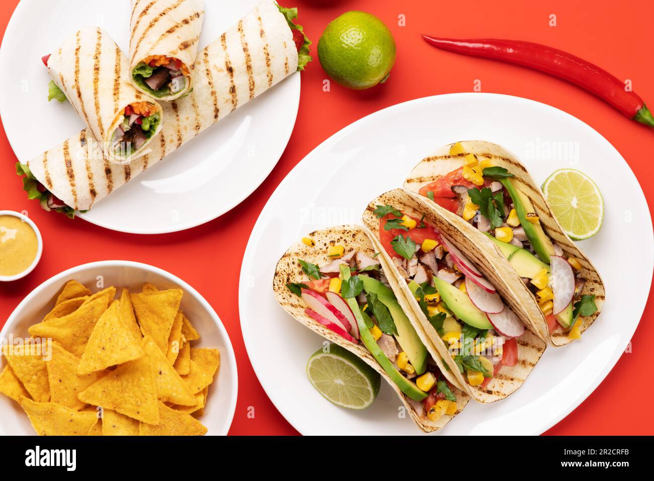 Mexican food featuring tacos, burritos, nachos and more Stock Photo - Alamy