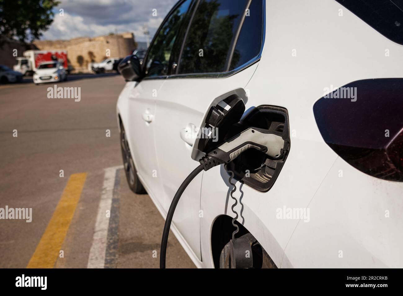 Charge plug in electric or hybrid car. Electric vehicle charging ...