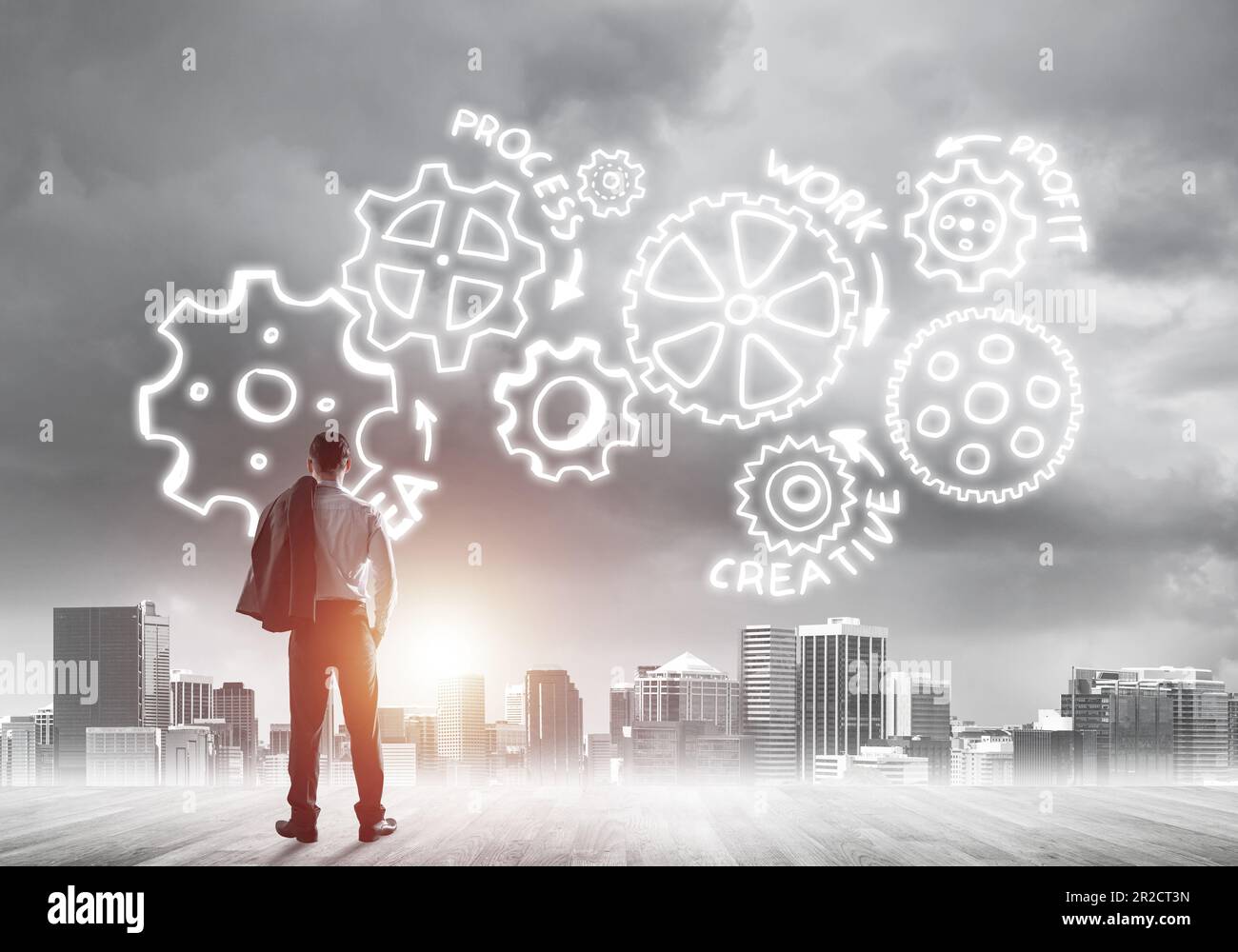Cogwheel engine drawn on screen as symbol for teamwork and cooperation ...